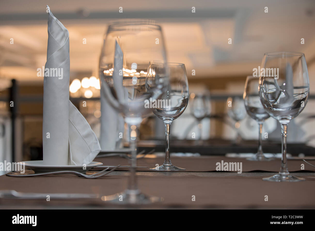 Glass goblets on the restaurant table Stock Photo - Alamy