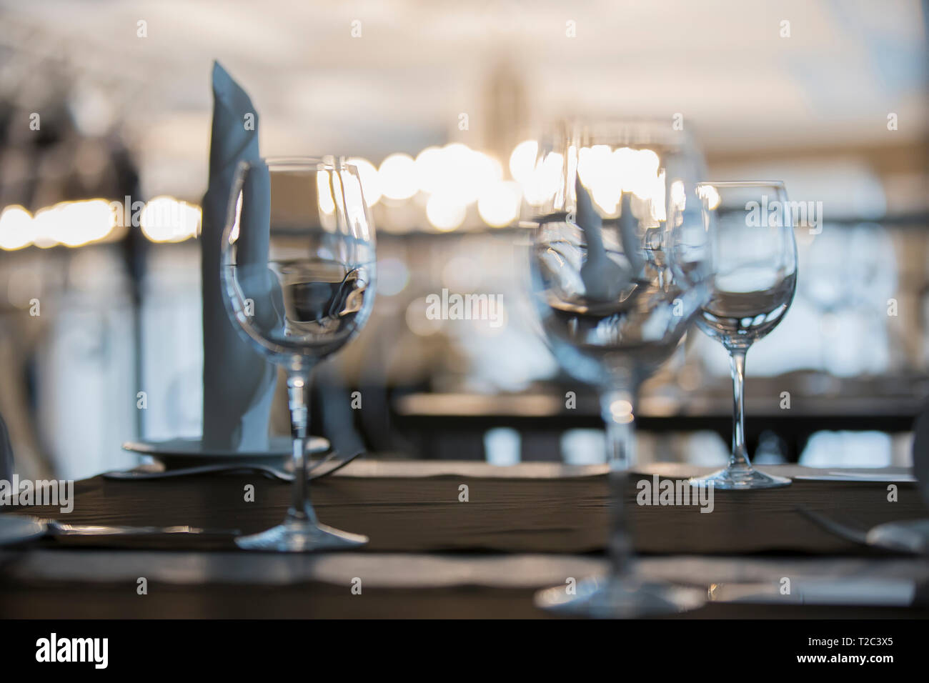 Glass goblets on the restaurant table Stock Photo - Alamy