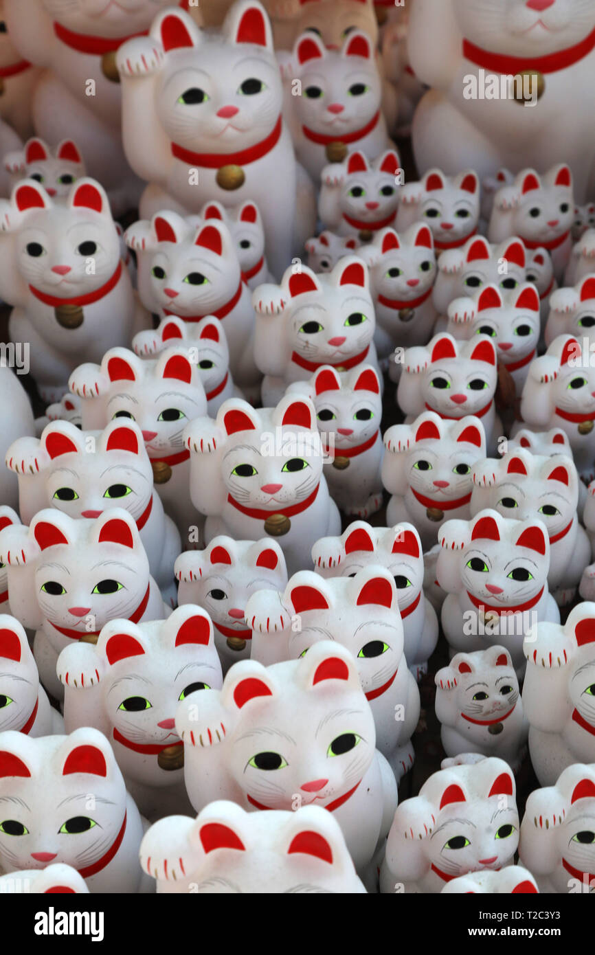 Maneki-Neko waving cat statues at the Gotokuji Temple in the Setagaya ...