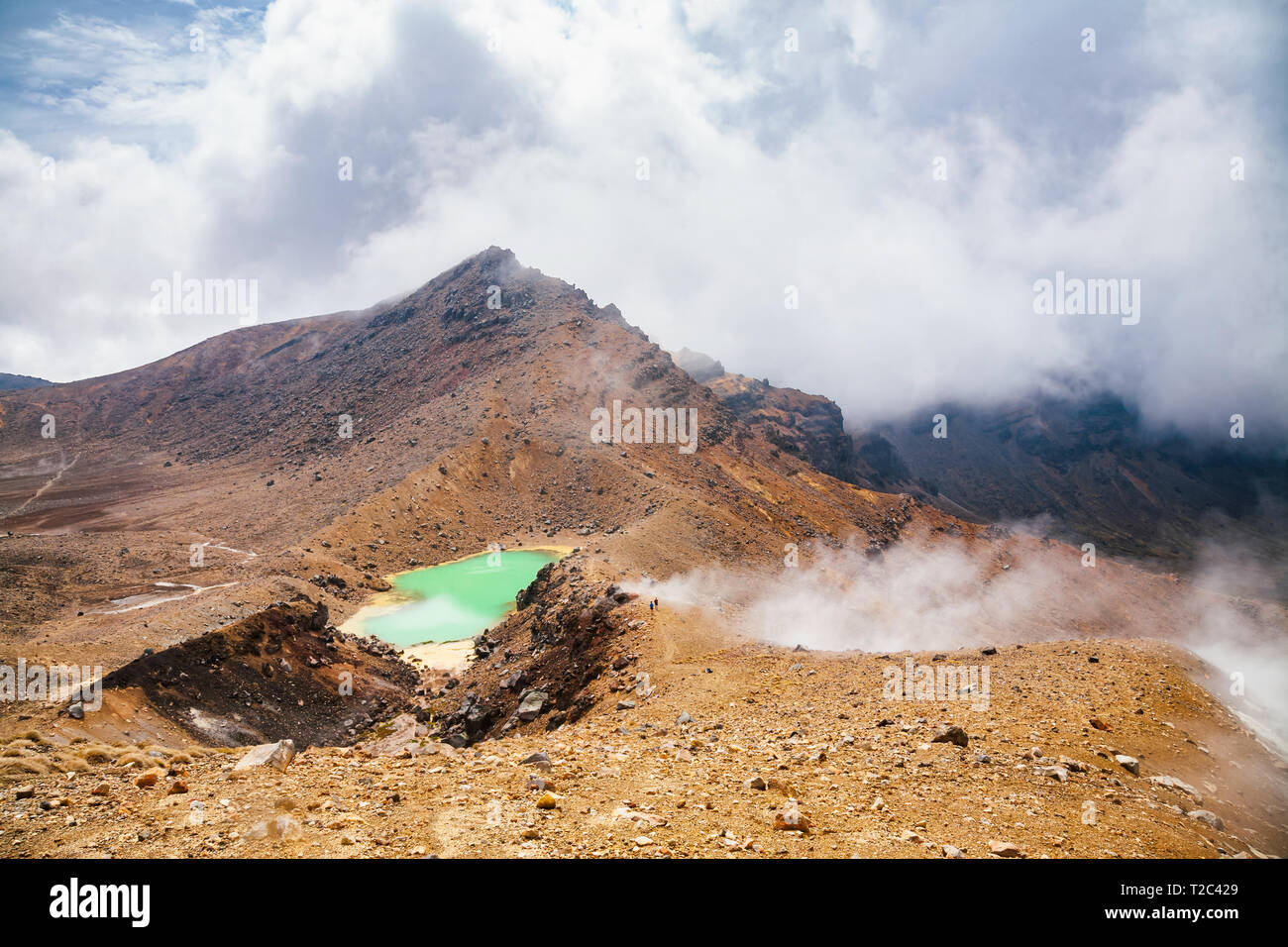 Hikers at Tongariro Alpine Crossing tramping track, one of the most ...