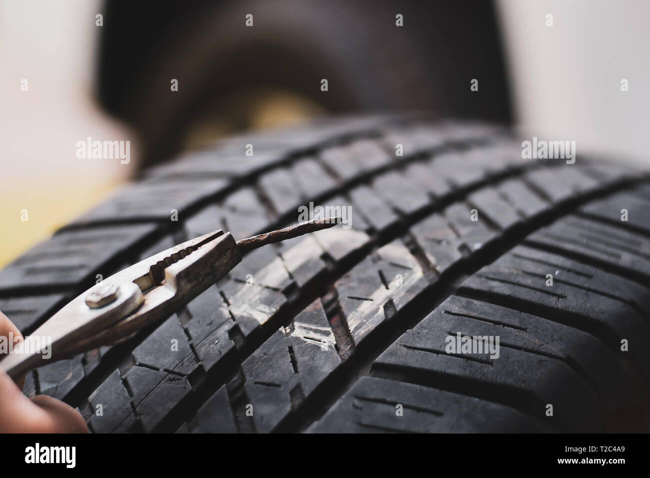 Tyre nail puncture hi-res stock photography and images - Alamy