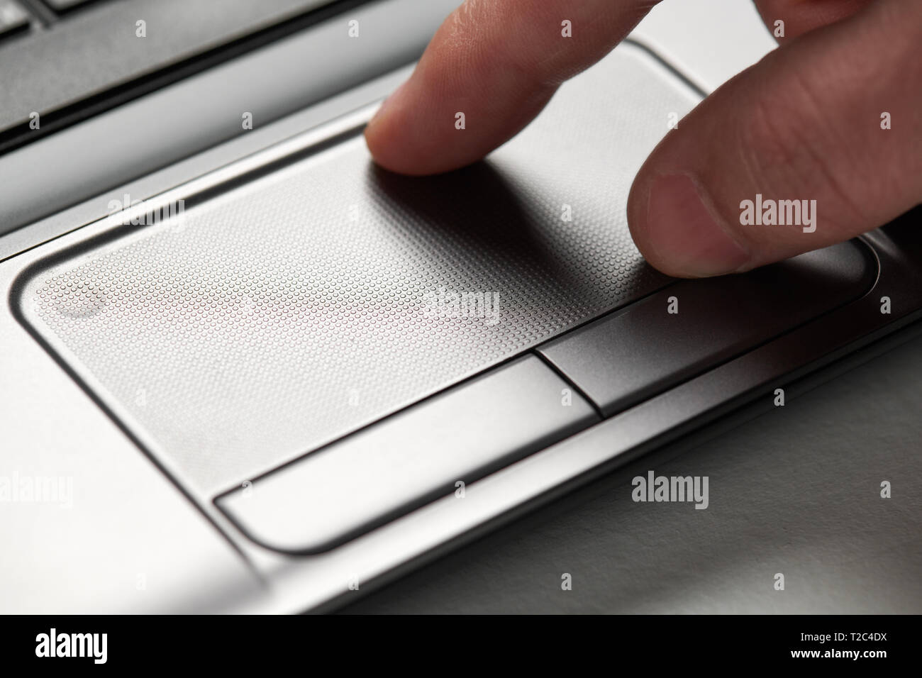 Touchpad with fingers hi-res stock photography and images - Alamy