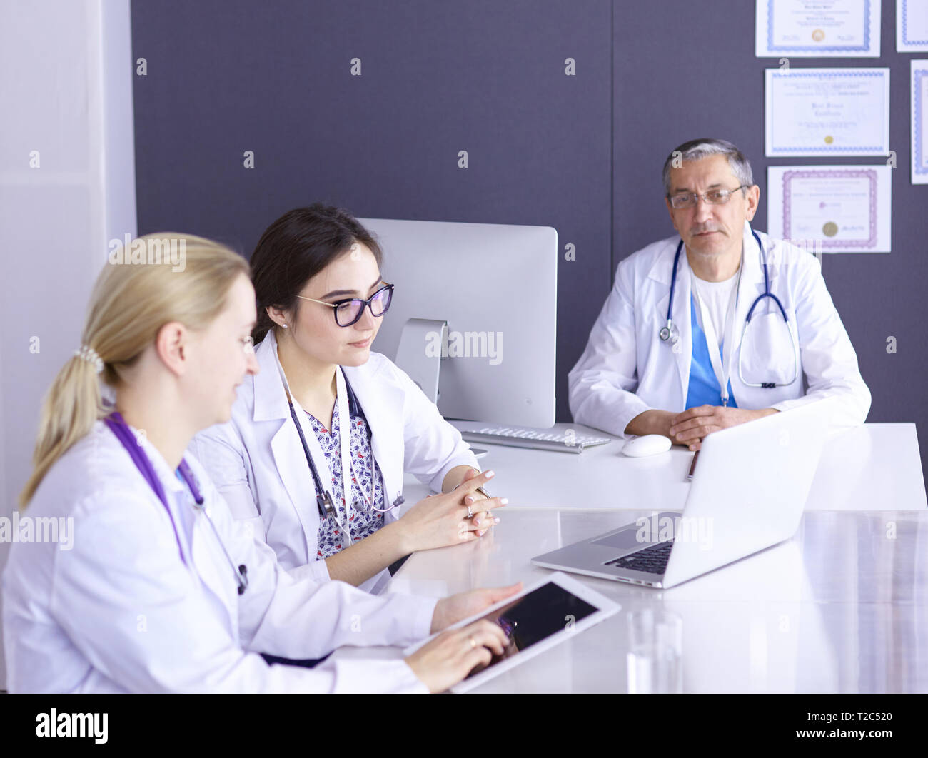 Doctors having a medical discussion in a meeting room Stock Photo - Alamy
