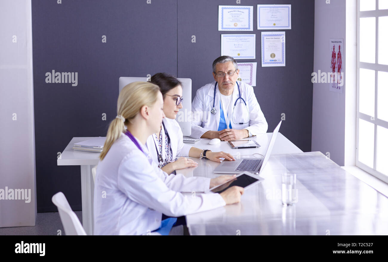 Doctors having a medical discussion in a meeting room Stock Photo - Alamy