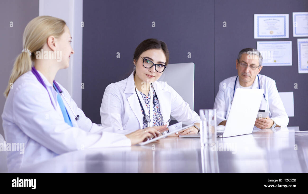 Doctors having a medical discussion in a meeting room Stock Photo - Alamy