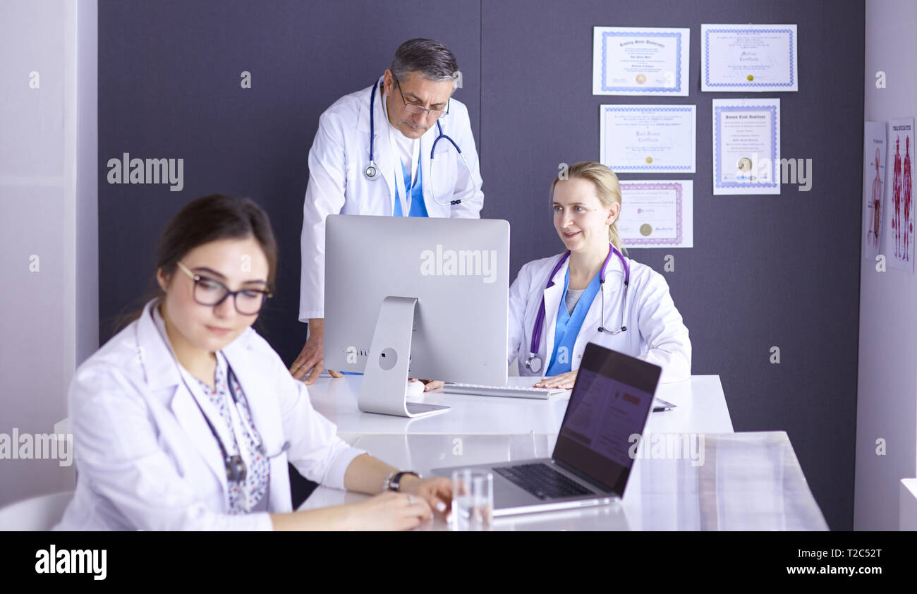 Doctors having a medical discussion in a meeting room Stock Photo - Alamy