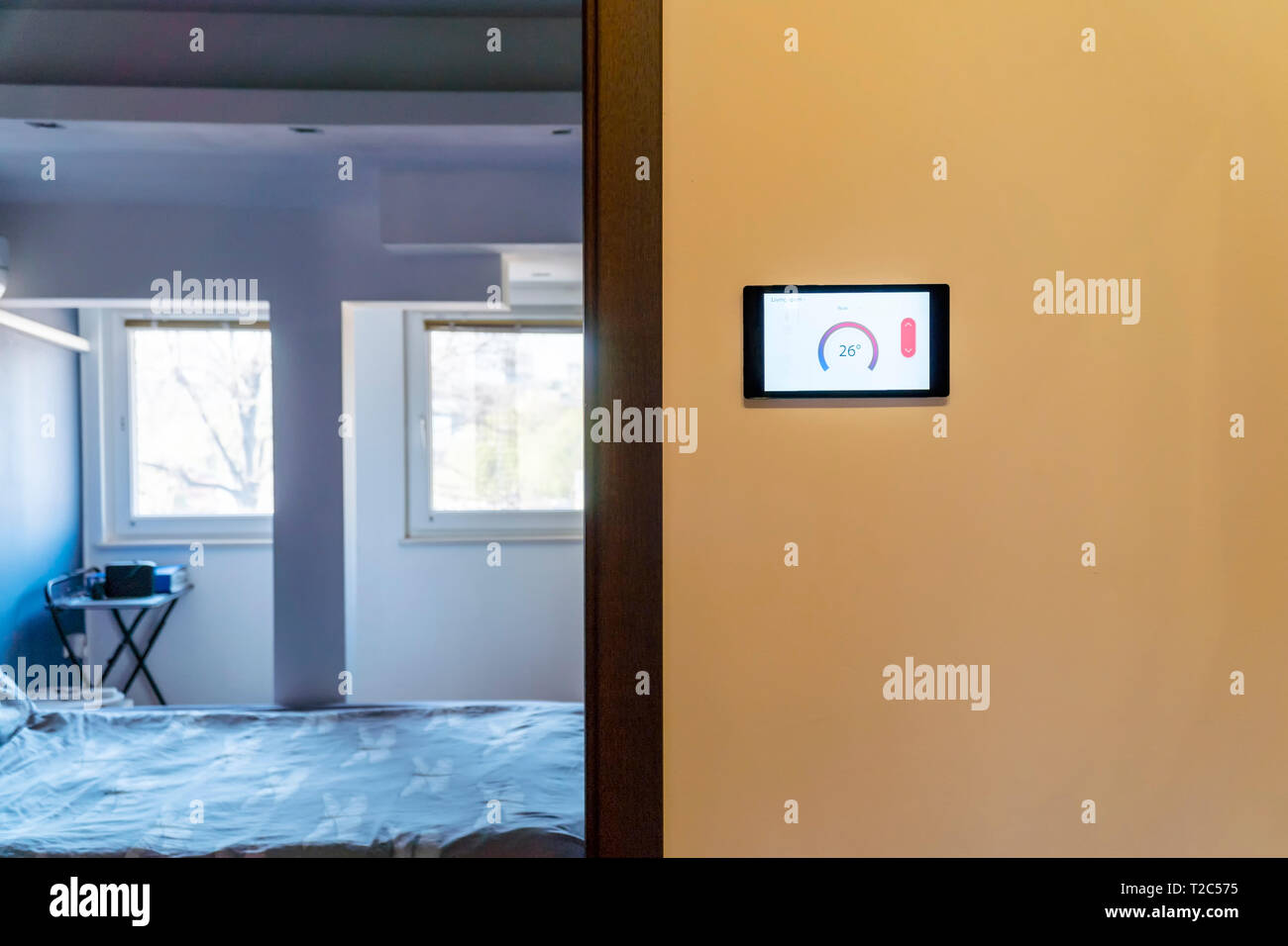 Smart home temperature control concept. Device with software ...