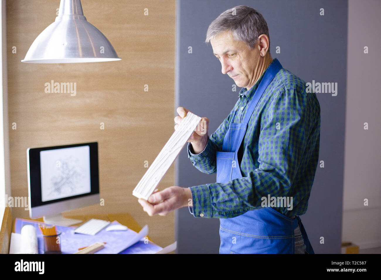 profession, carpentry, woodwork and people concept - carpenter testing ...