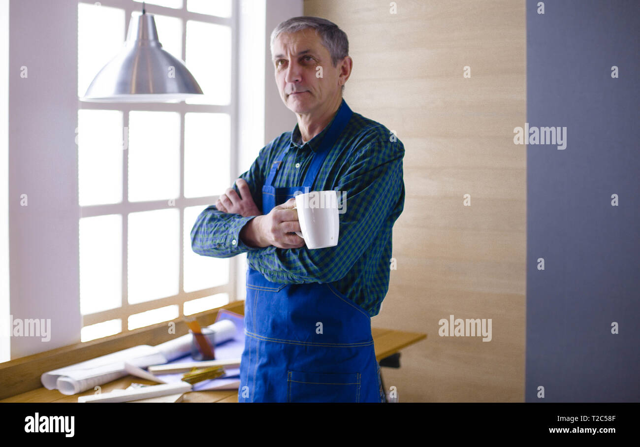 profession, carpentry, woodwork and people concept - carpenter testing ...