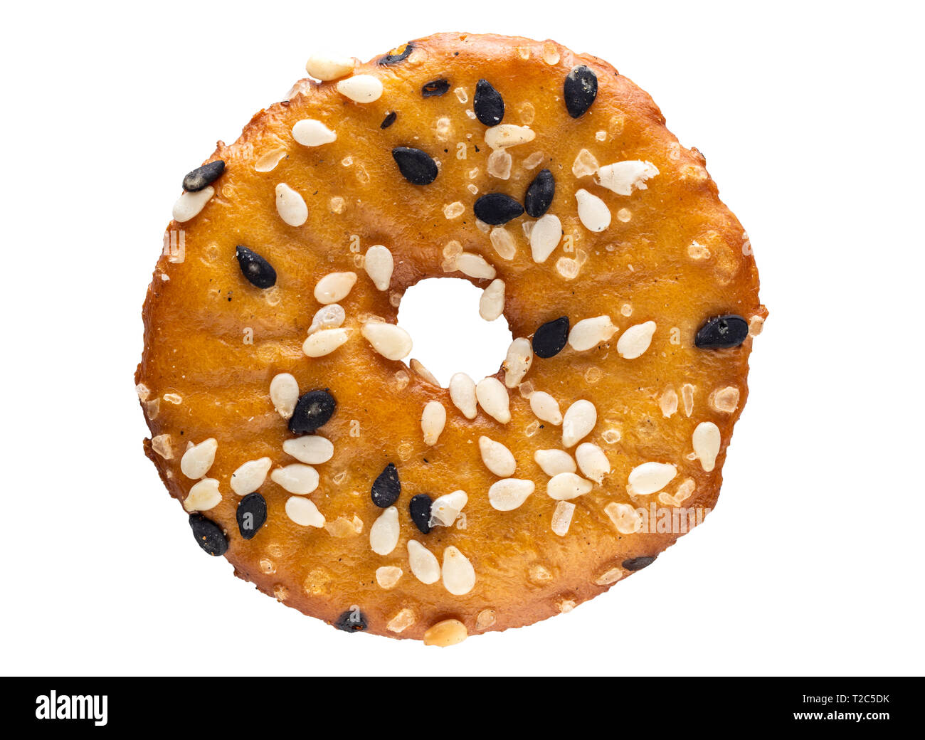 Extreme macro shot of a cracker with sesame seeds and salt on it ...