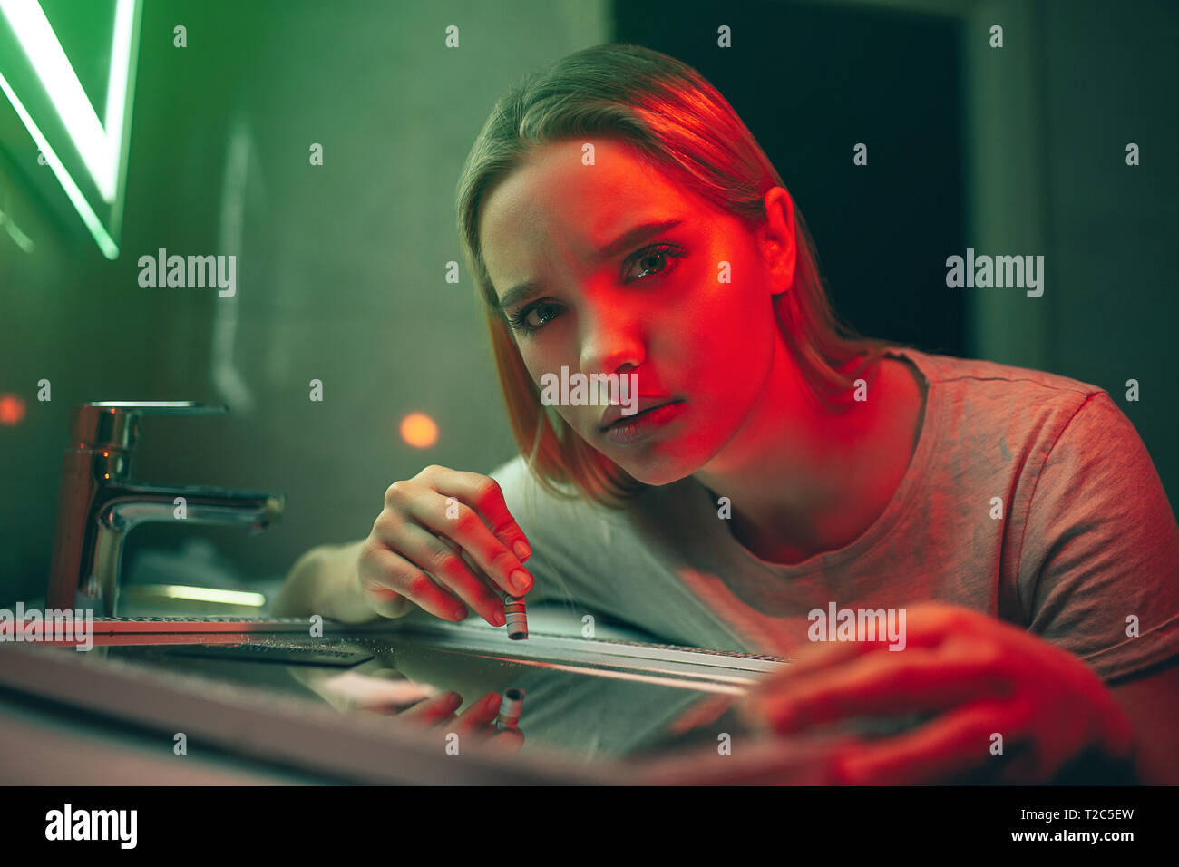 Drugs destroy your life. Portrait of young drug addict with rolled ...