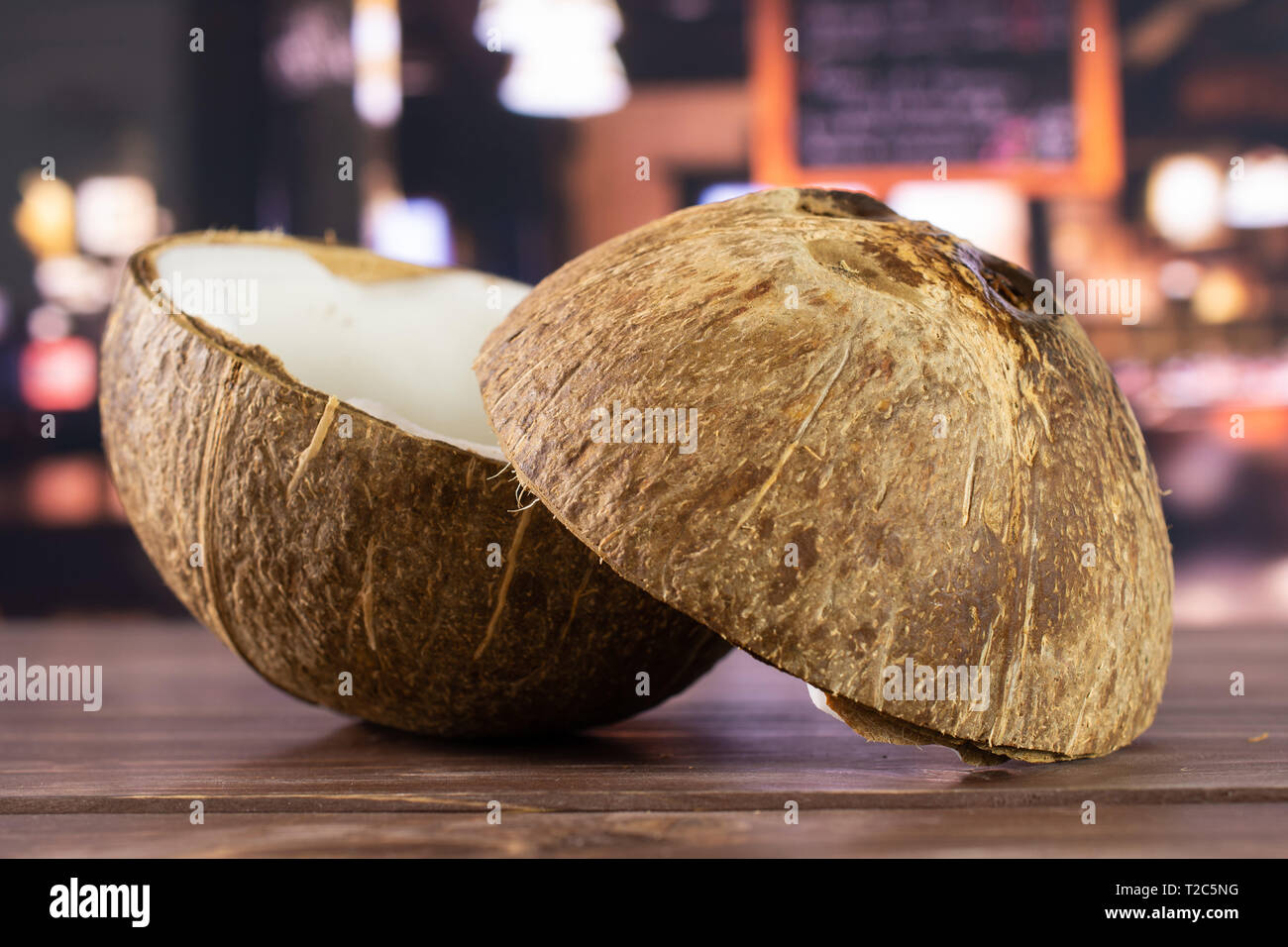Cut coconut in half restaurant hi-res stock photography and images - Alamy