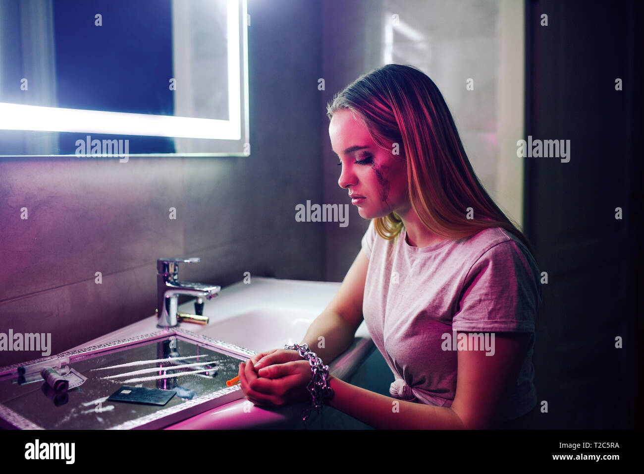 Drugs hurt and tie hands. Side view of drug addict tied hands with ...
