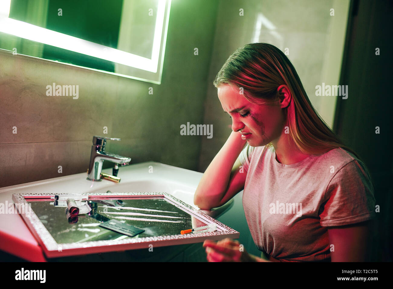 Drugs kill you. Say no to drug. Drug addict looks on drugs with disgust ...