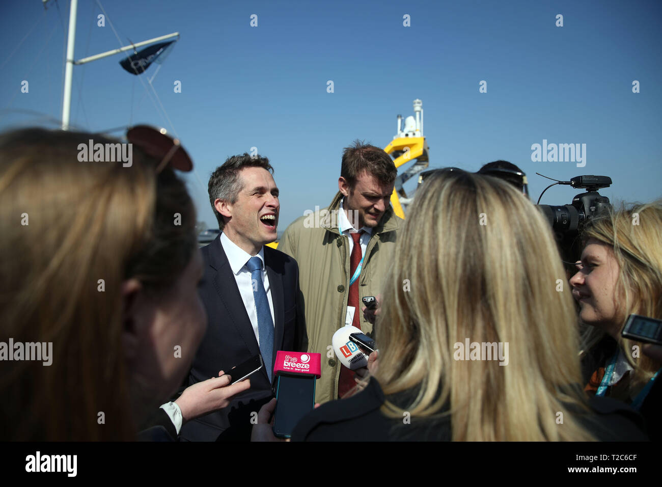 Defence Secretary Gavin Williamson (second left) during a visit to the ...