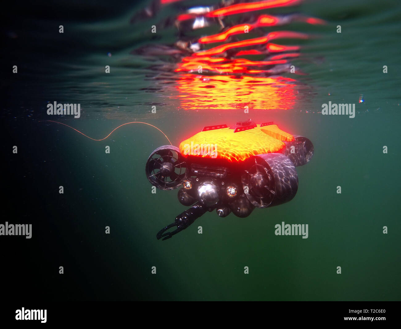 Royal Navy personel demonstrating their underwater drone during a visit ...