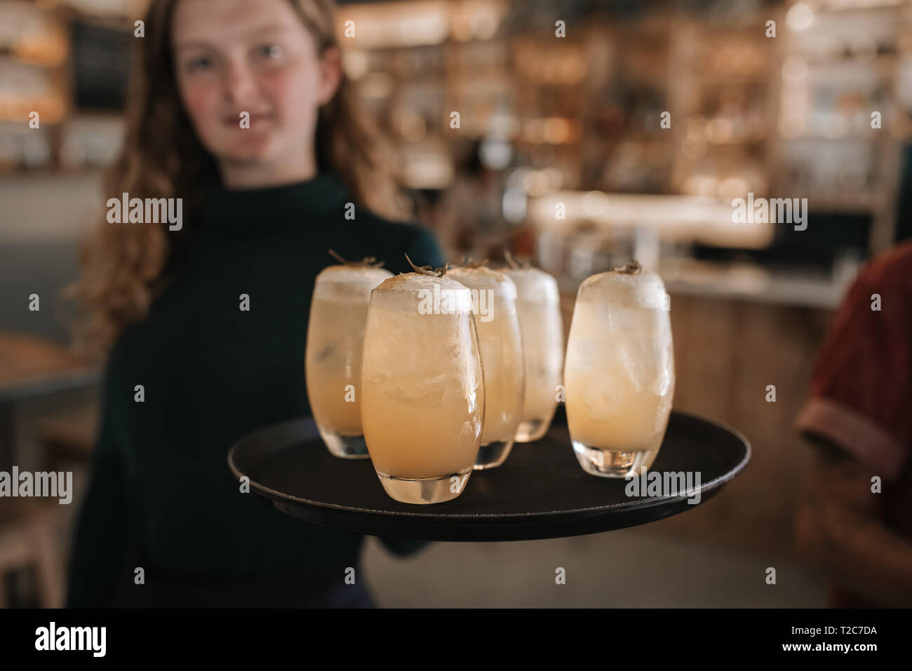 Carrying drinks club hi-res stock photography and images - Alamy