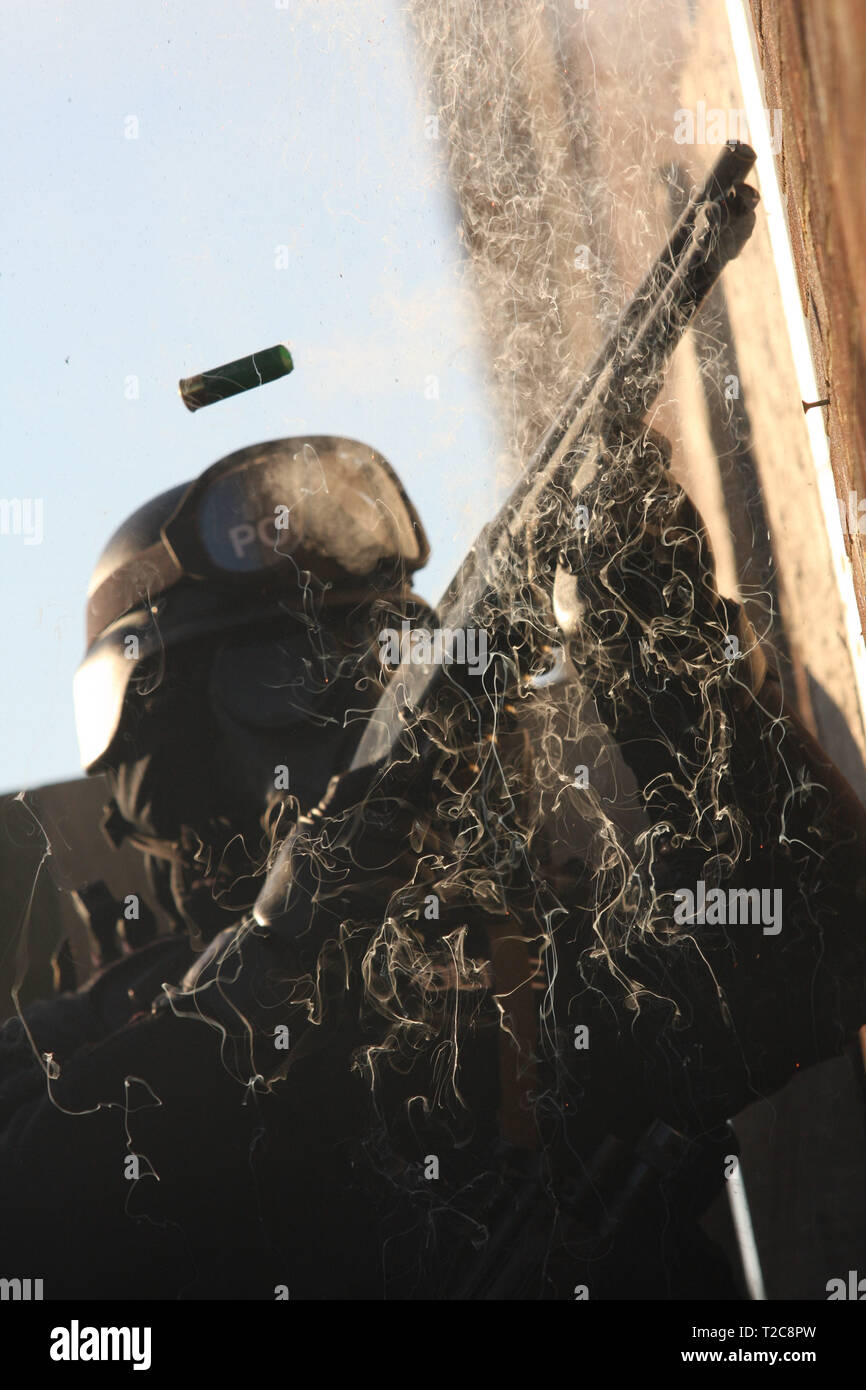 Uk armed police mask hi-res stock photography and images - Alamy