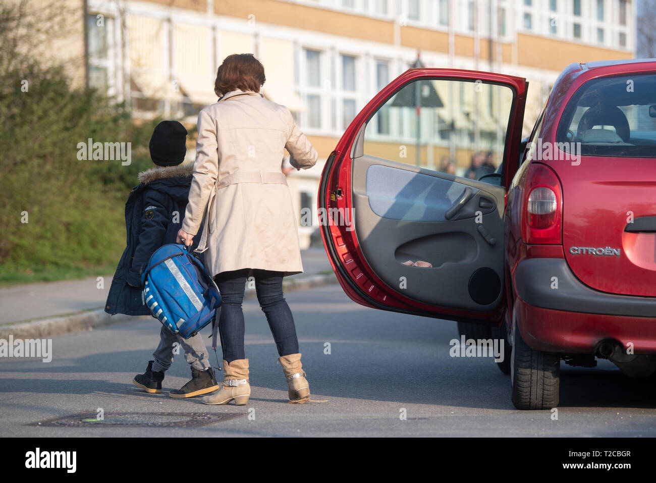 Parents take their children for a walk hi-res stock photography and ...