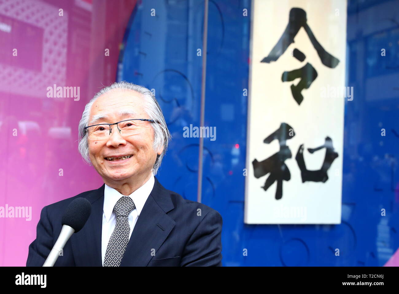 Japanese chirographer Hakko Ishitobi speaks before his calligraphic ...