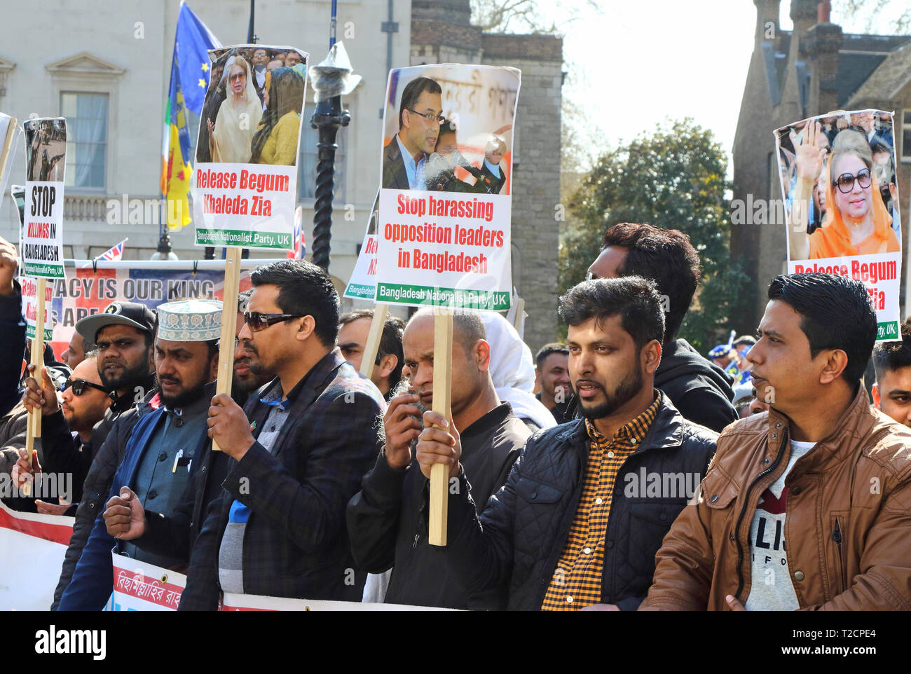 Protesters are seen holding placards during the demonstration ...