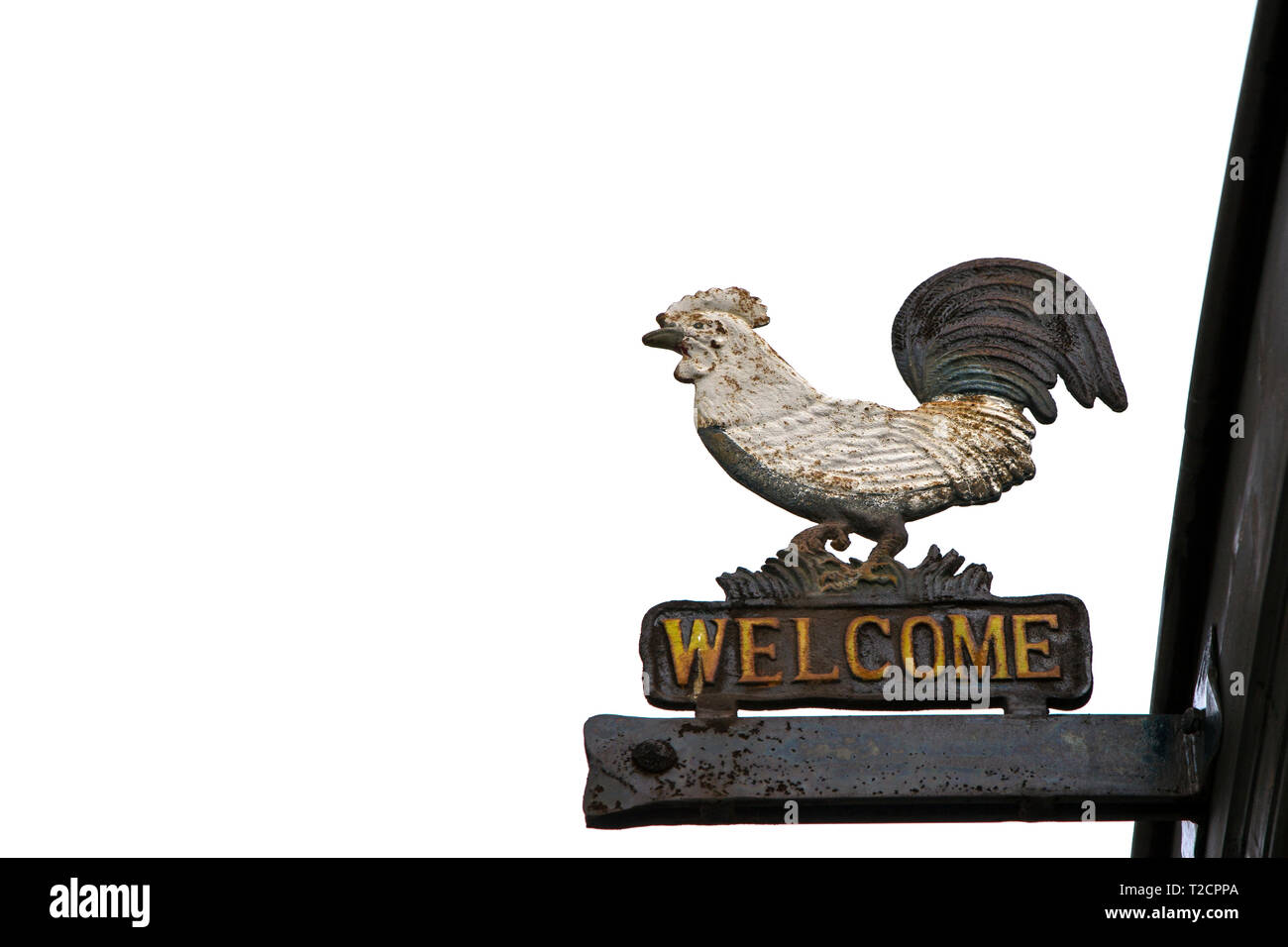 Rusty welcome sign with cock Stock Photo - Alamy