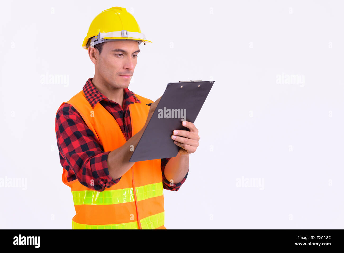 Young spanish worker writing hi-res stock photography and images - Alamy