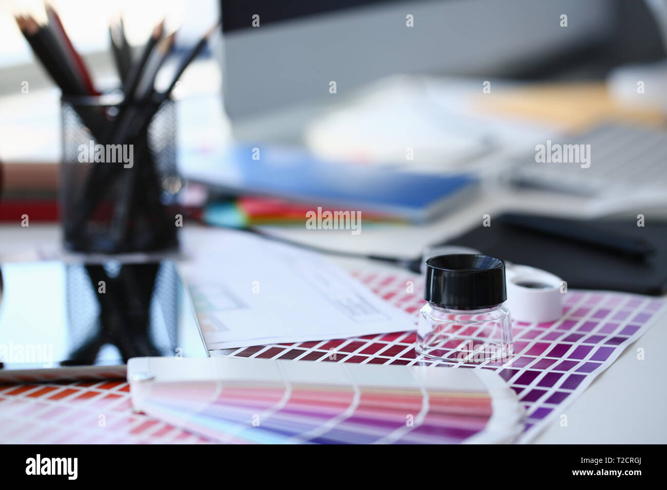 Test print paper page with colour test design fantail and magnifying ...