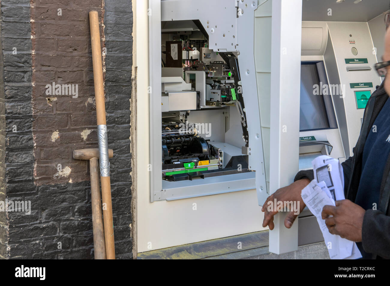 Repairing An ATM Amsterdam The Netherlands 2019 Stock Photo - Alamy