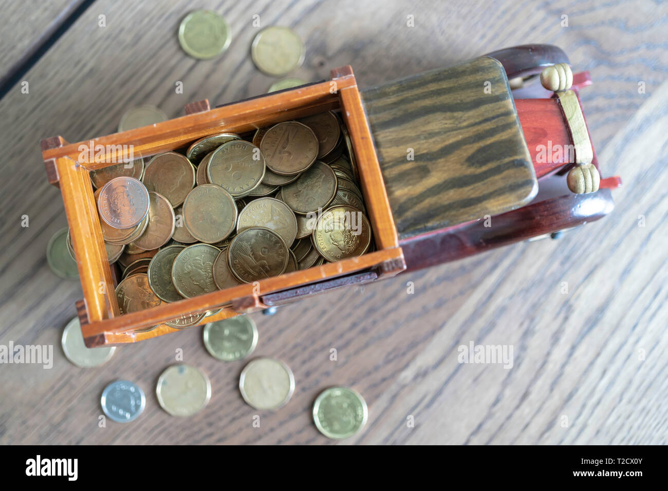 Carrying coins hi-res stock photography and images - Alamy