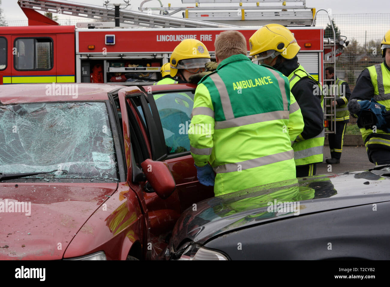 Training exercise of road traffic accident cutting victim out of car ...