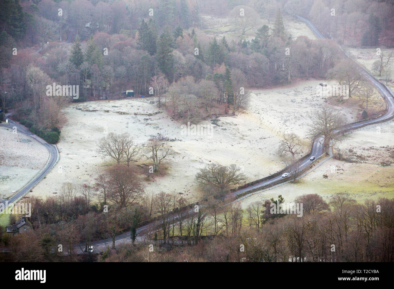Cars on the Hwkshead/Ambleside road with a heavy frost, Lake District ...