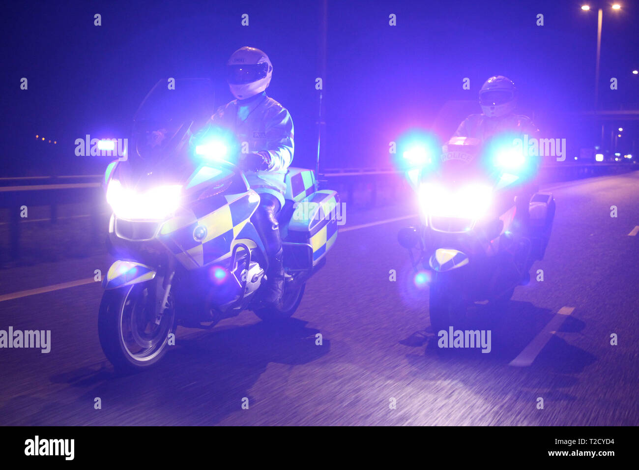 Traffic Police at night on Motorbikes Stock Photo - Alamy