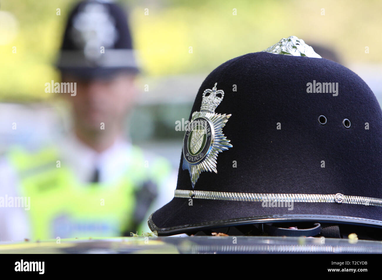 Police helmet handcuffs hi-res stock photography and images - Alamy