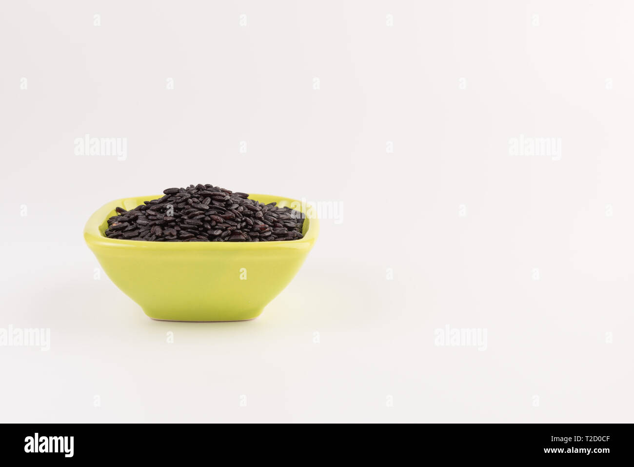bowl of black wild rice isolated on white background Stock Photo - Alamy