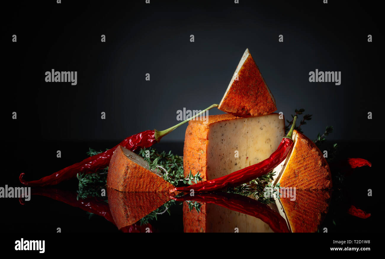 Red Pecorino sheep milk cheese with thyme and red pepper. Traditional ...