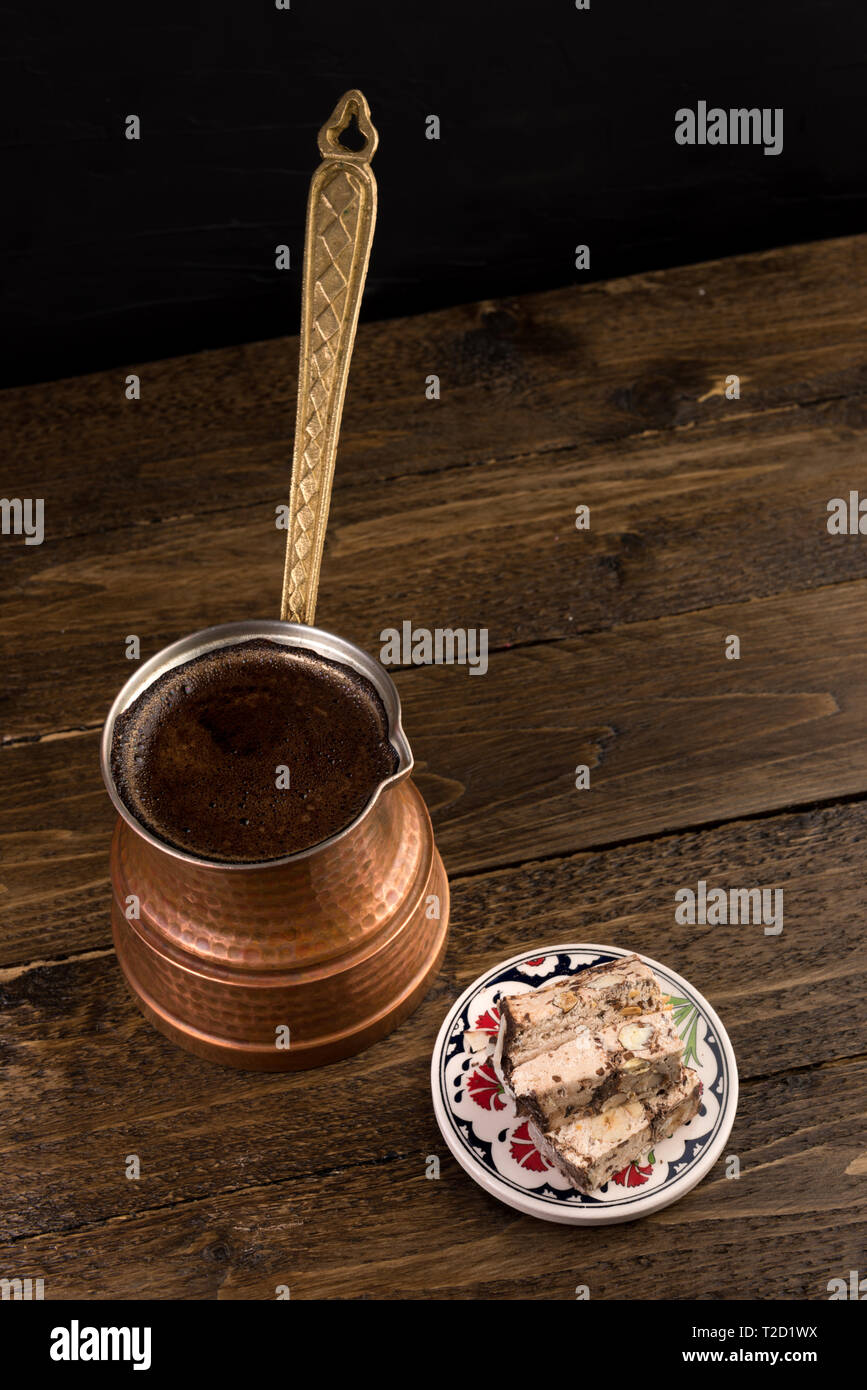 Traditional turkish coffee and turkish delight on dark background ...