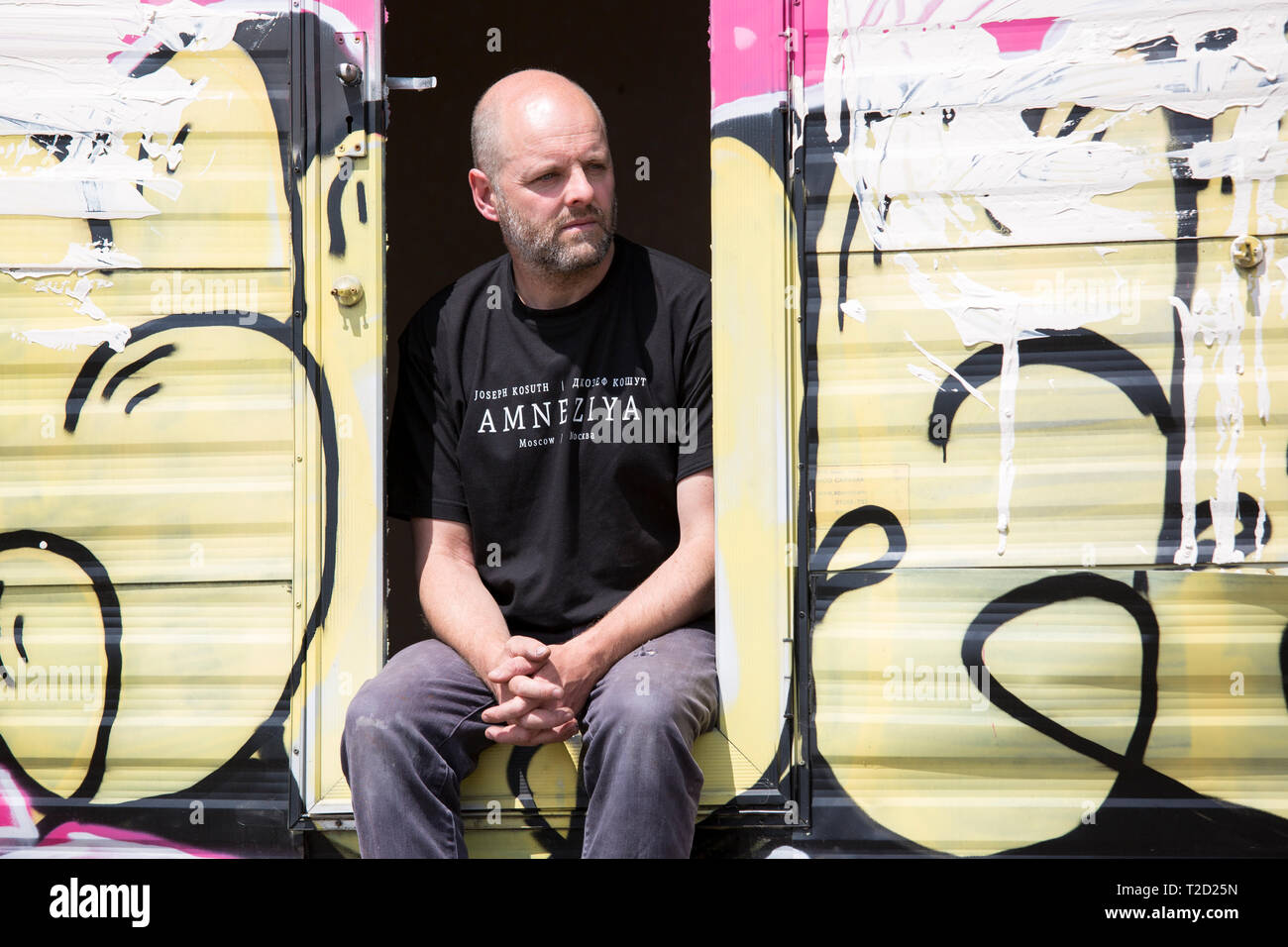 Gavin Turk, artist, photographed with a caravan (not his artwork) on ...