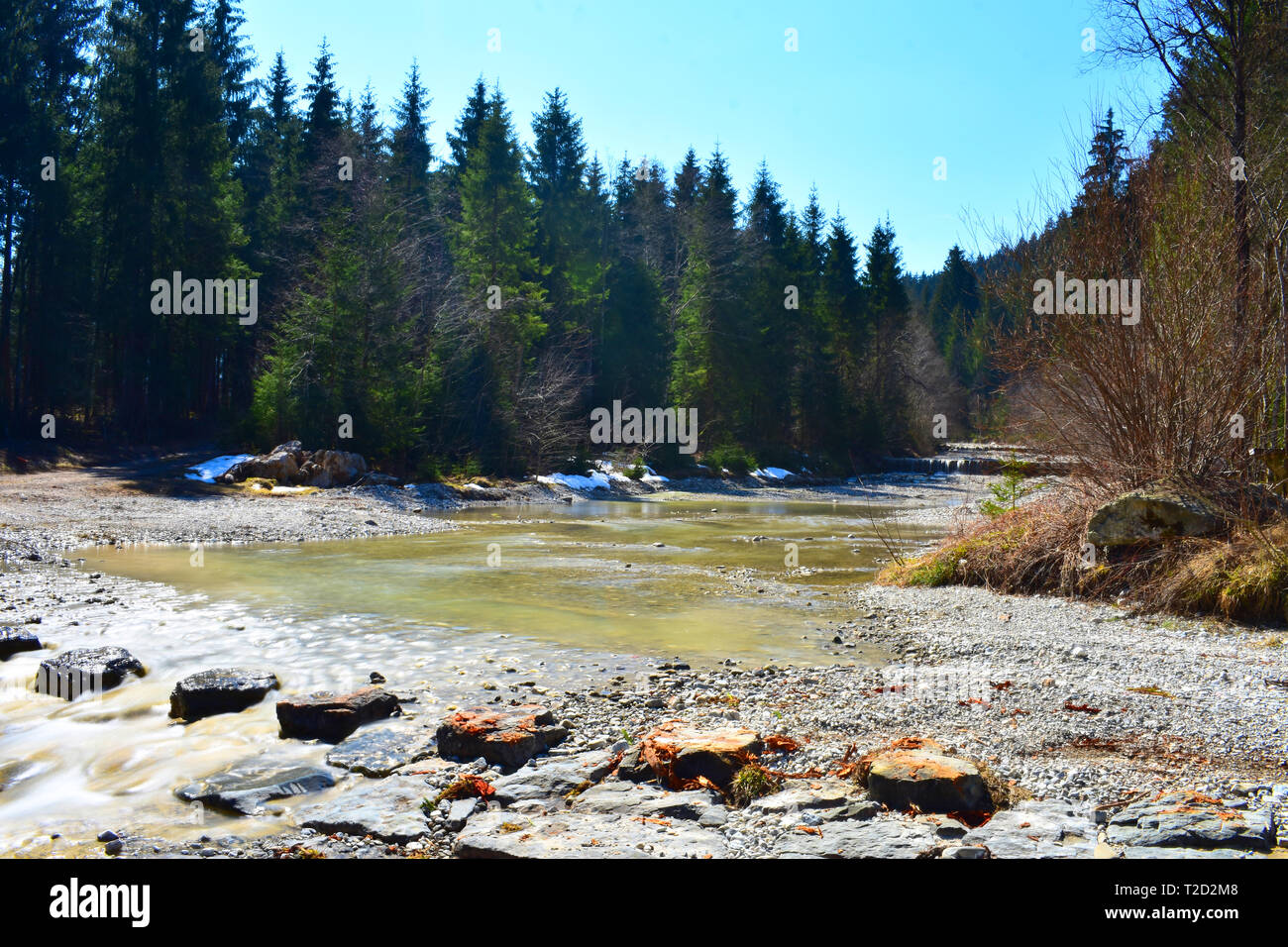 Photo of a river and a waterfall in the bavarian alps Stock Photo - Alamy