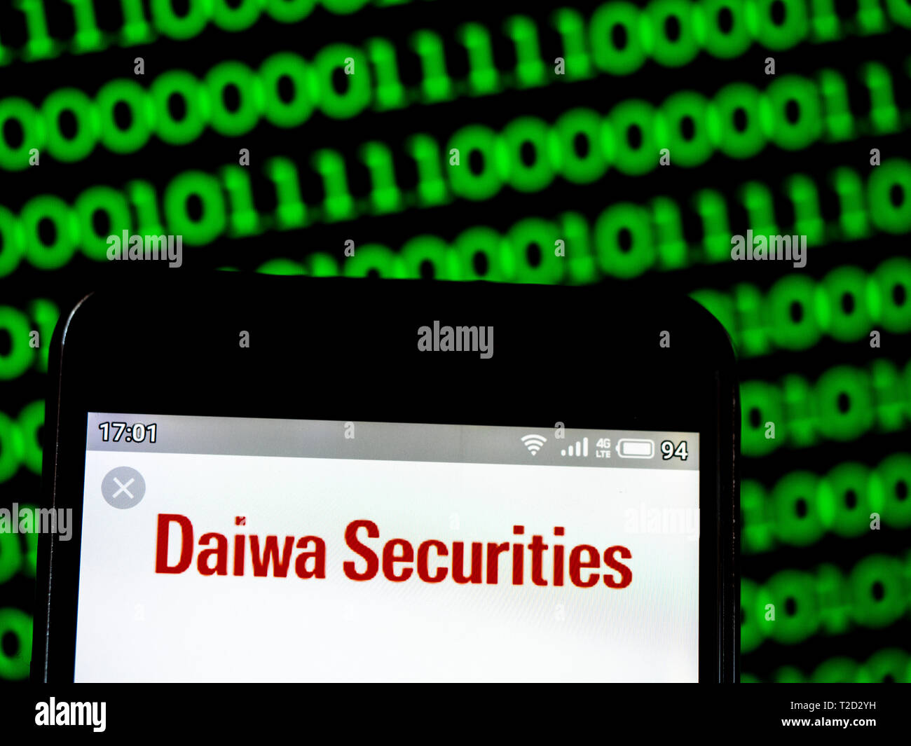 In this photo illustration a Daiwa Securities Group Inc logo seen ...