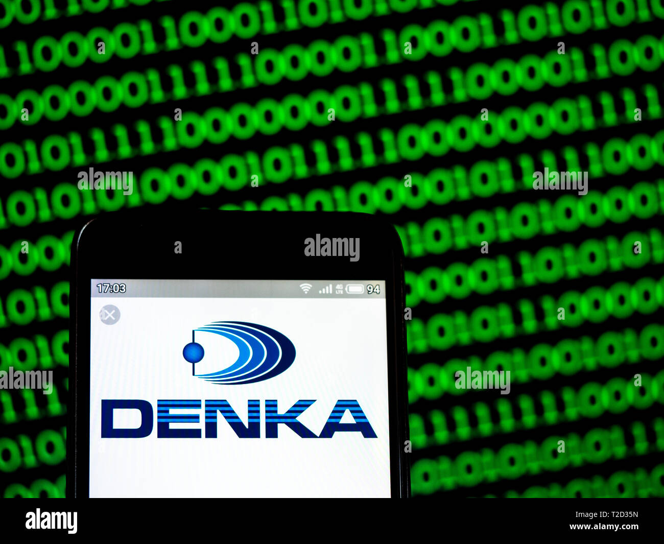 In this photo illustration a Denka Company Limited logo seen displayed ...