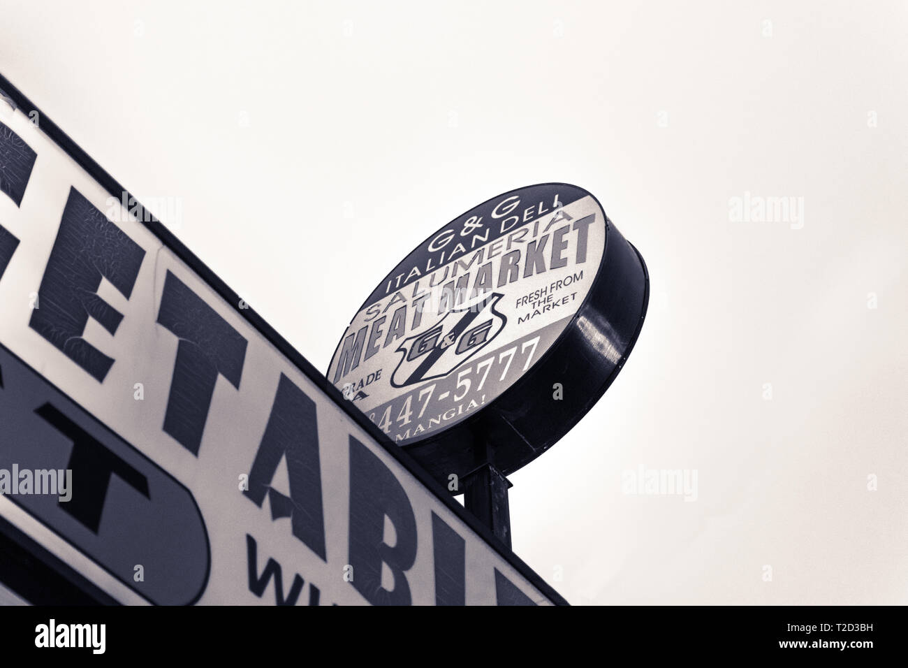 Business sign of a deli and meat market in black and white Stock Photo ...