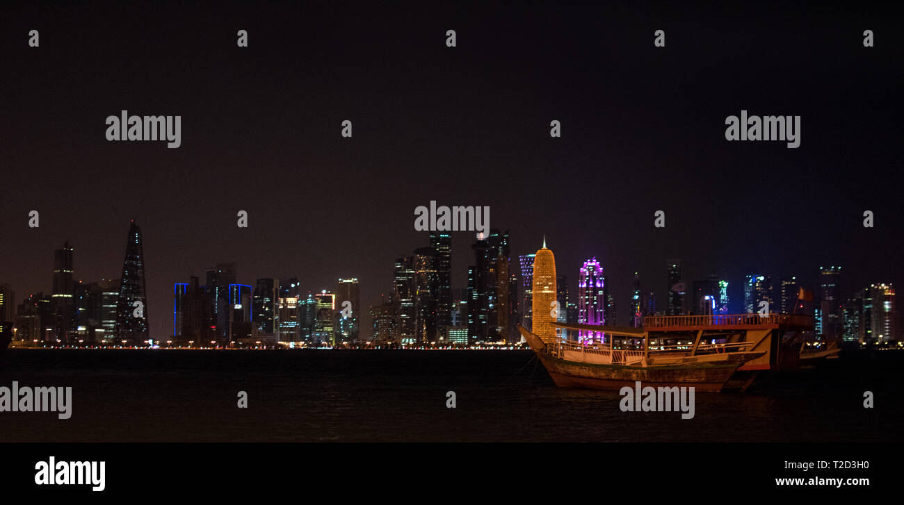 A panoramic view of the old dhow harbour night timelapse in Doha, Qatar ...