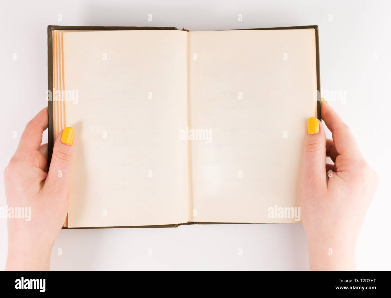 Person holding reading open newspaper hi-res stock photography and ...