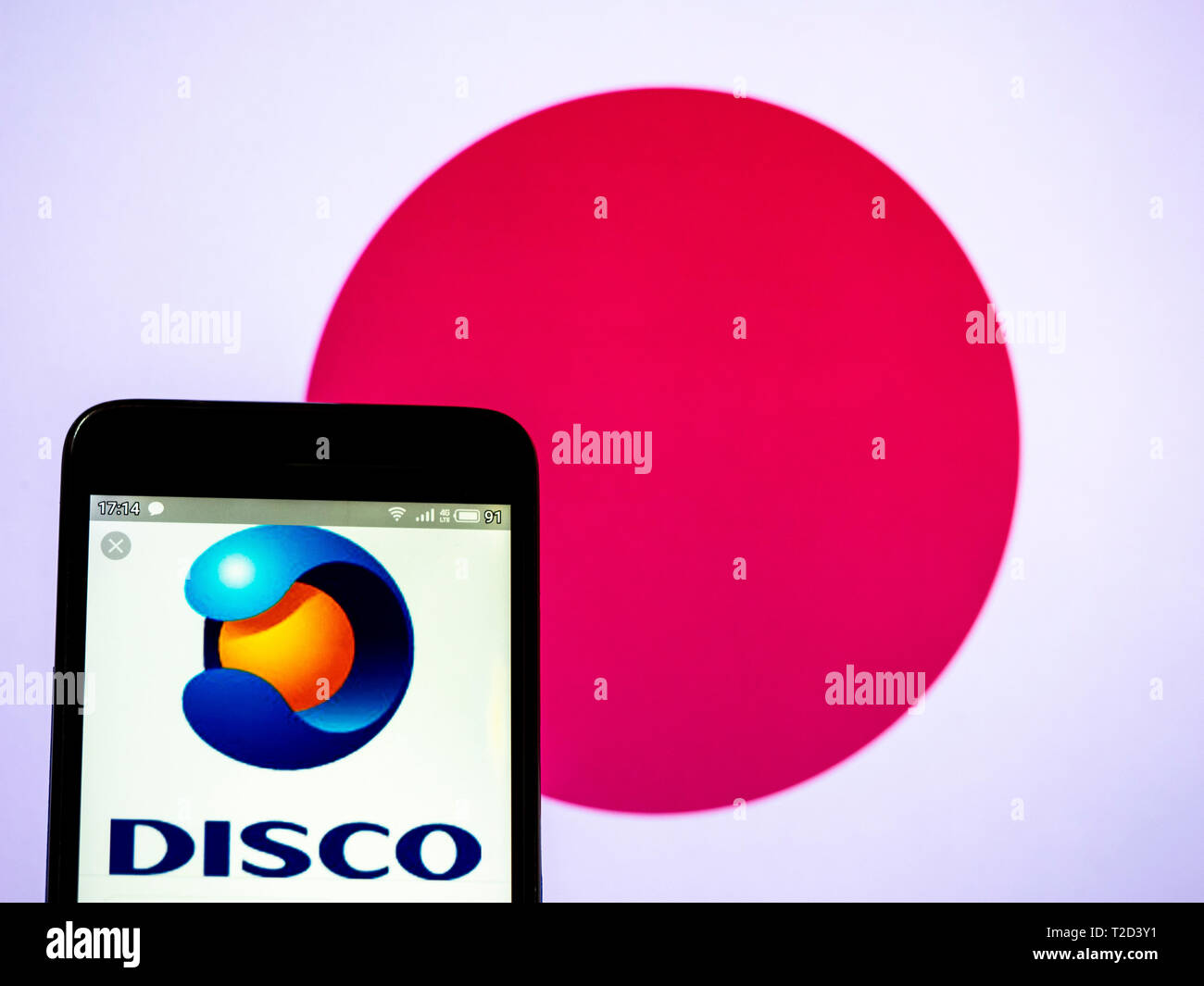 In this photo illustration a DISCO Corporation logo seen displayed on a ...