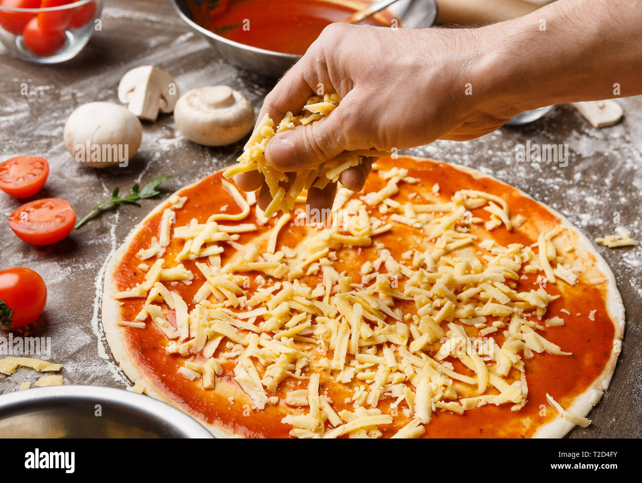 Adding toppings hi-res stock photography and images - Alamy
