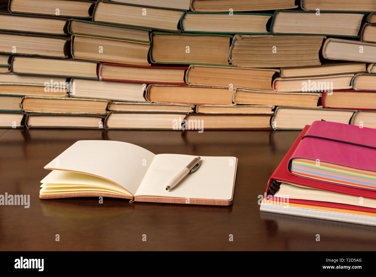 desktop with books and notebooks Stock Photo - Alamy