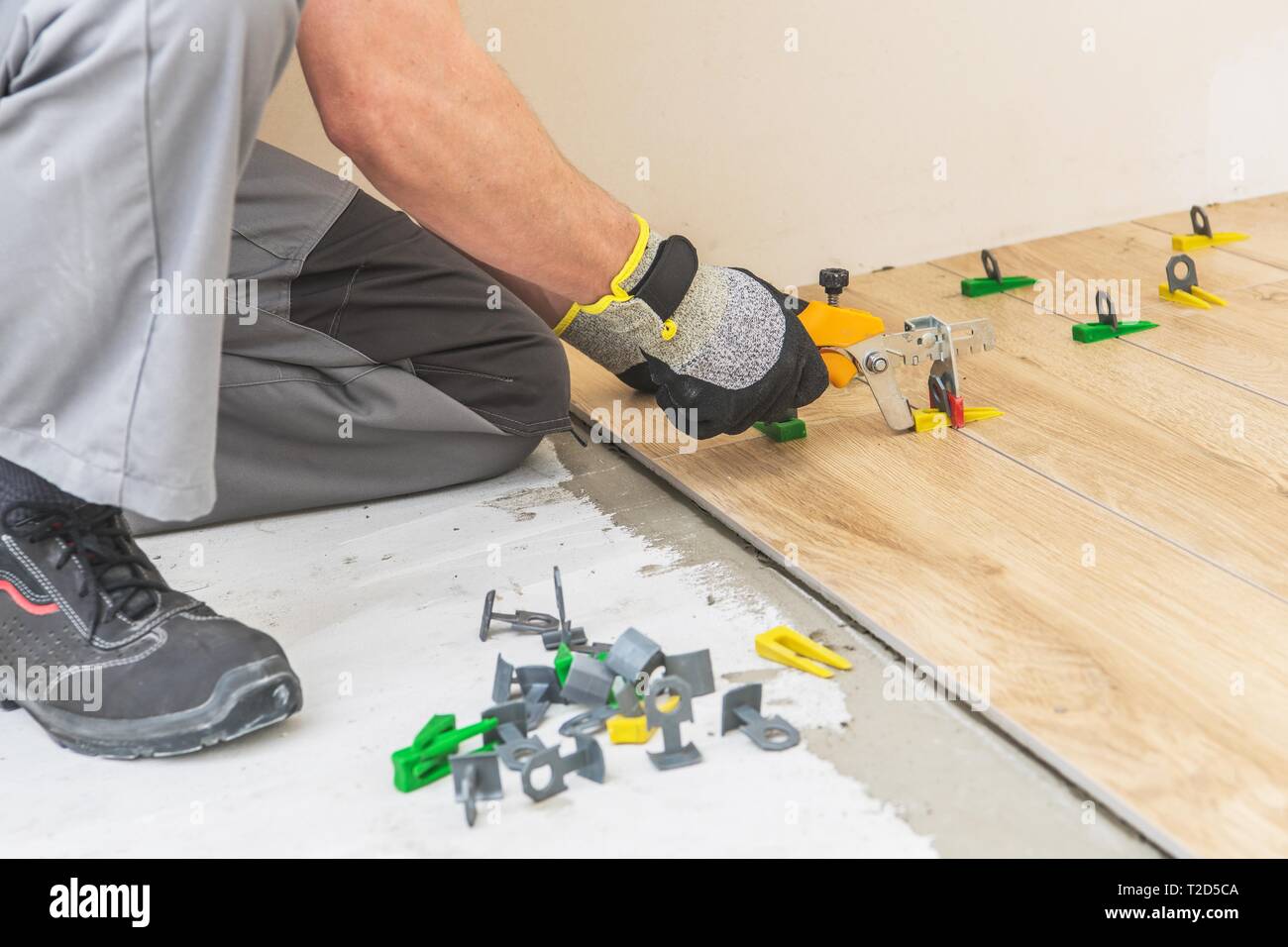 Ceramic Floor Tiles Installation by Professional Construction Worker ...
