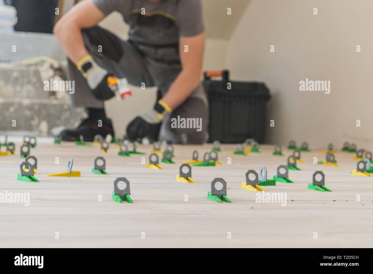 Floor Tiles Leveling System Installed by Professional Ceramic Tiles ...