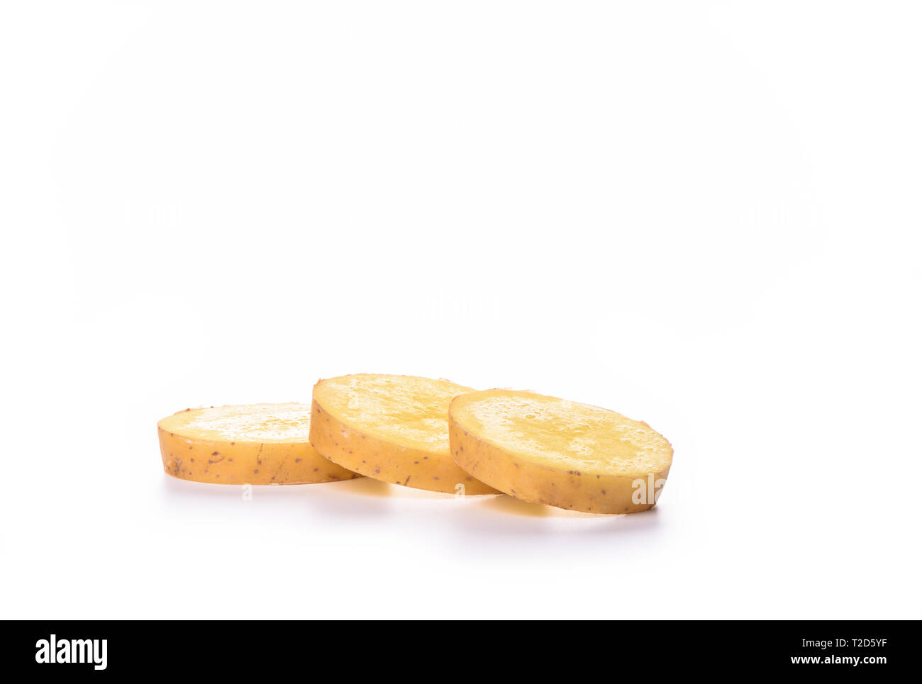 Potato cut slices isolated on white background. Copy space. Close up ...